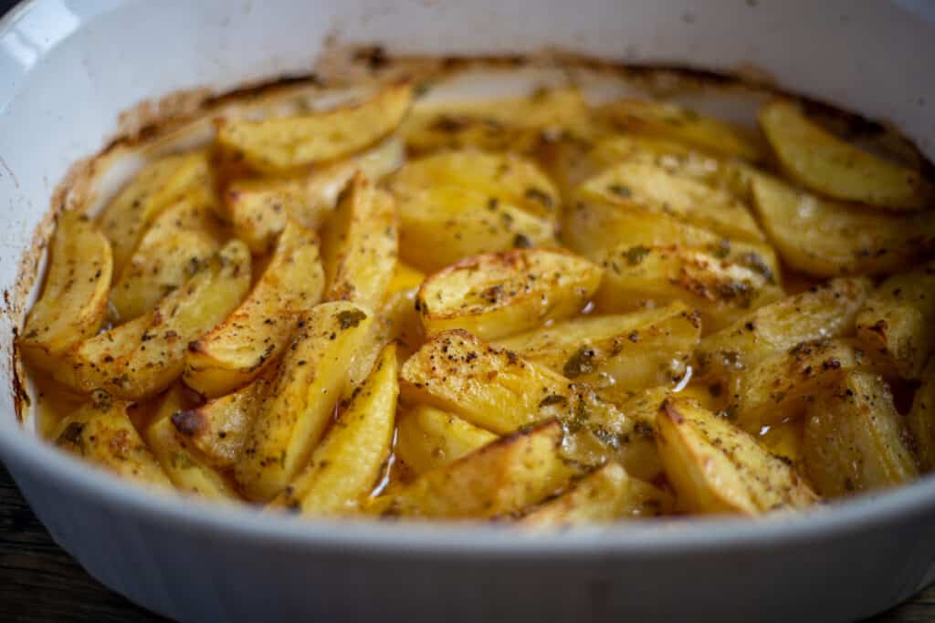 Greek Lemon Potatoes | She's Not Cookin'