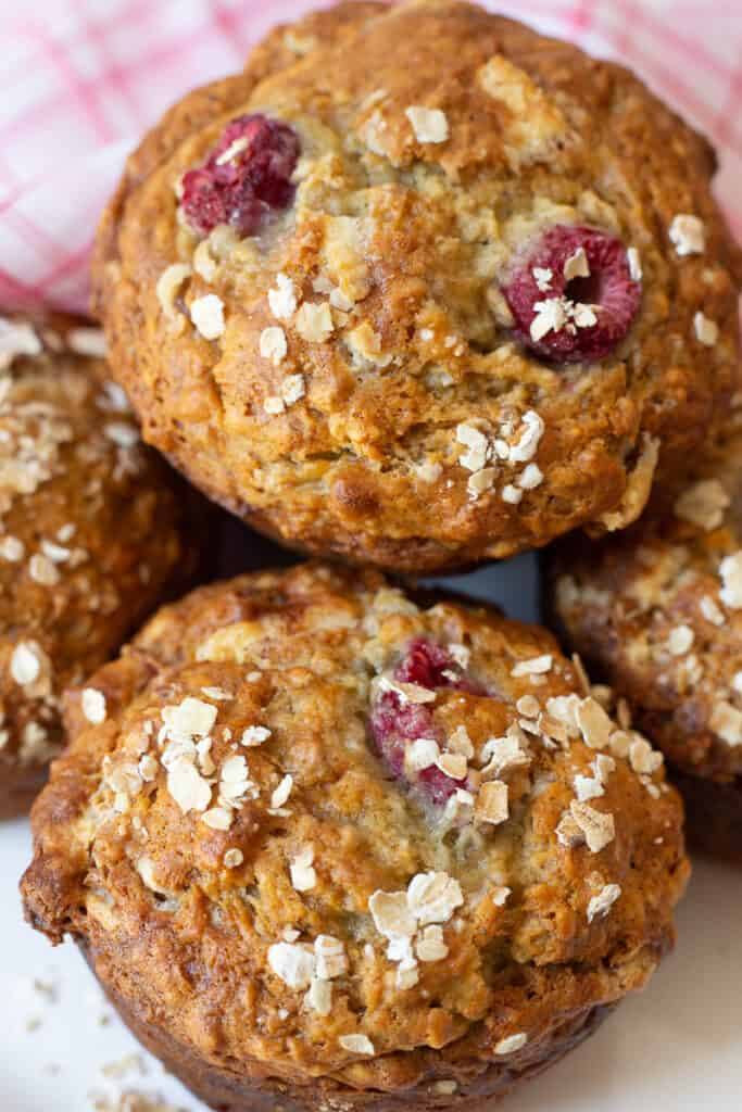 Banana Raspberry Muffins with White Chocolate Recipe | She's Not Cookin'