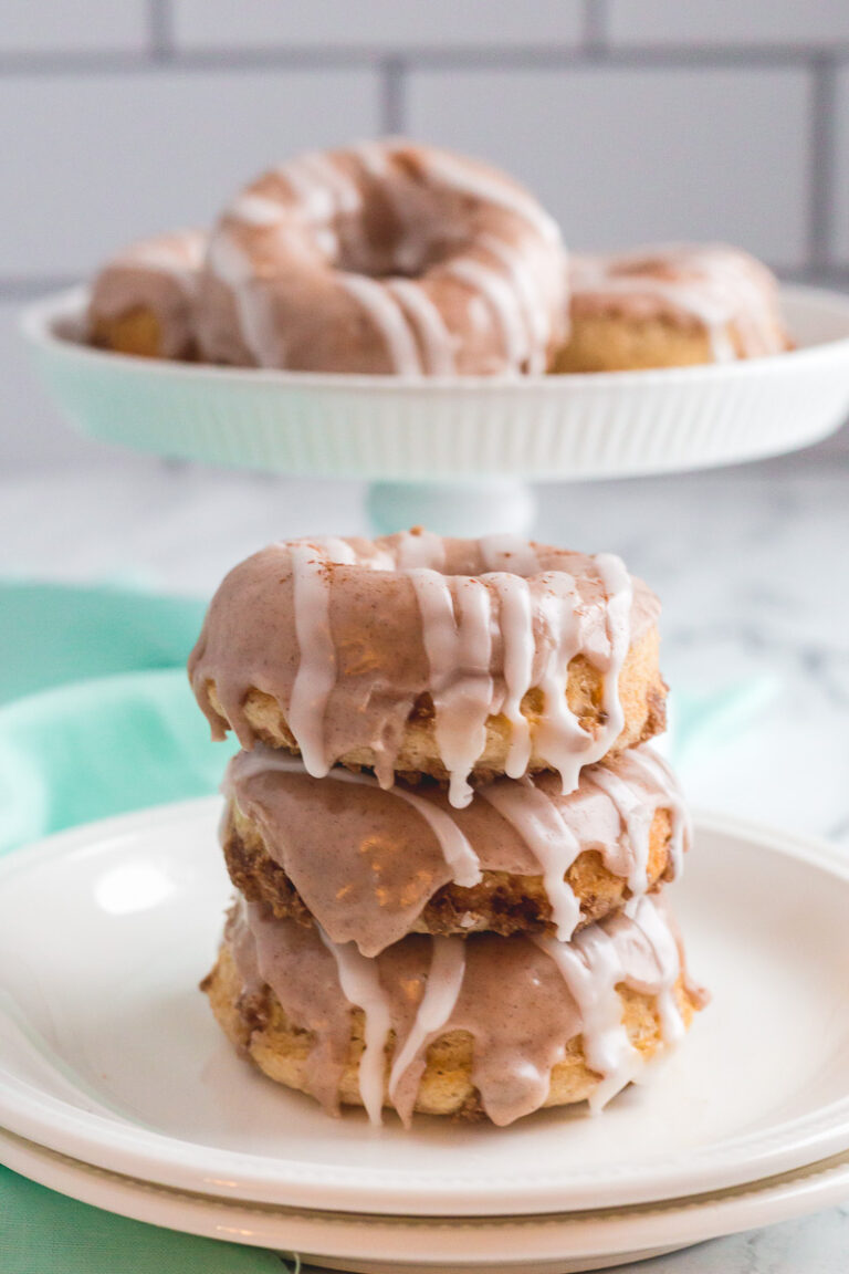 Easy Cinnamon Roll Baked Donuts | She's Not Cookin'