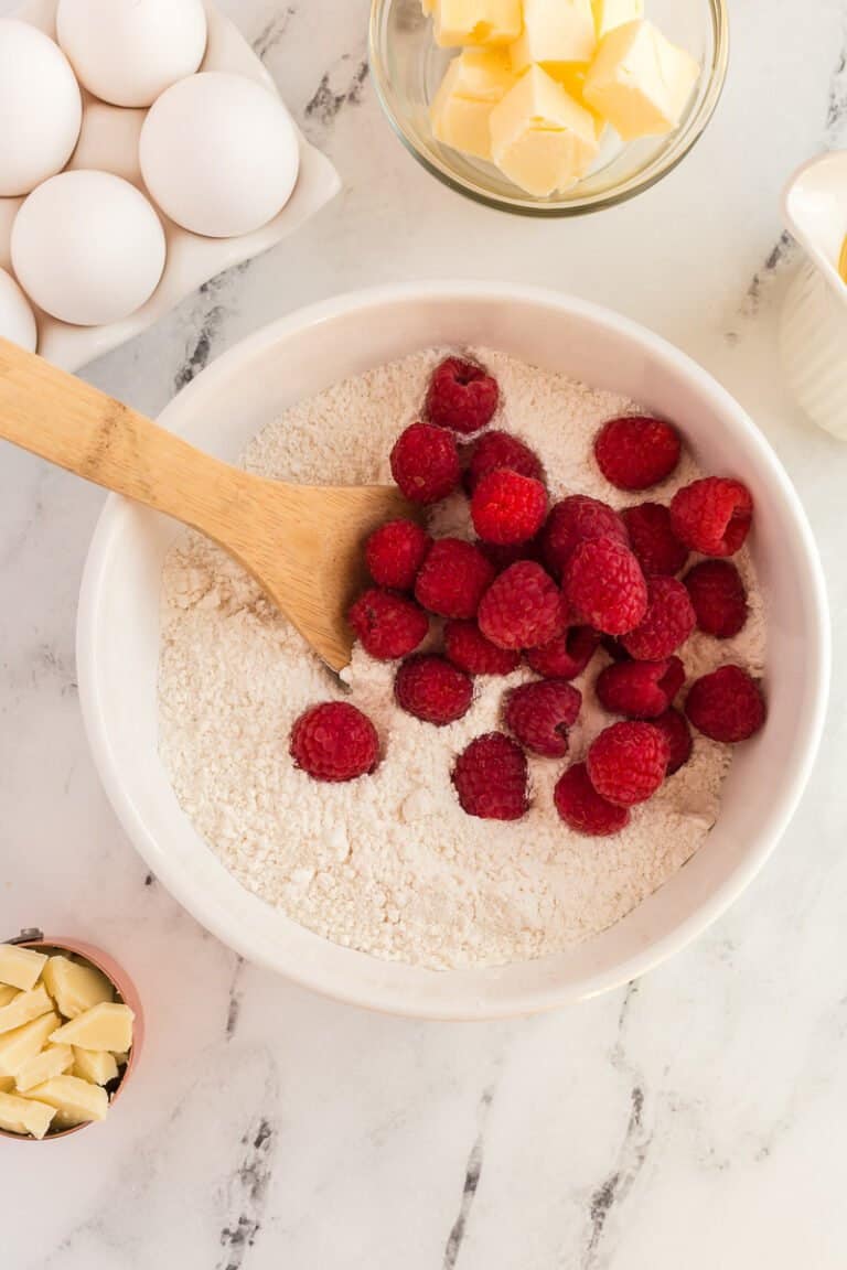 BEST Raspberry and White Chocolate Loaf Cake | She's Not Cookin'