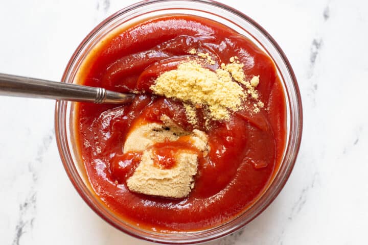 Bacon-Wrapped Meatloaf with Brown Sugar-Ketchup Glaze | She's Not Cookin'