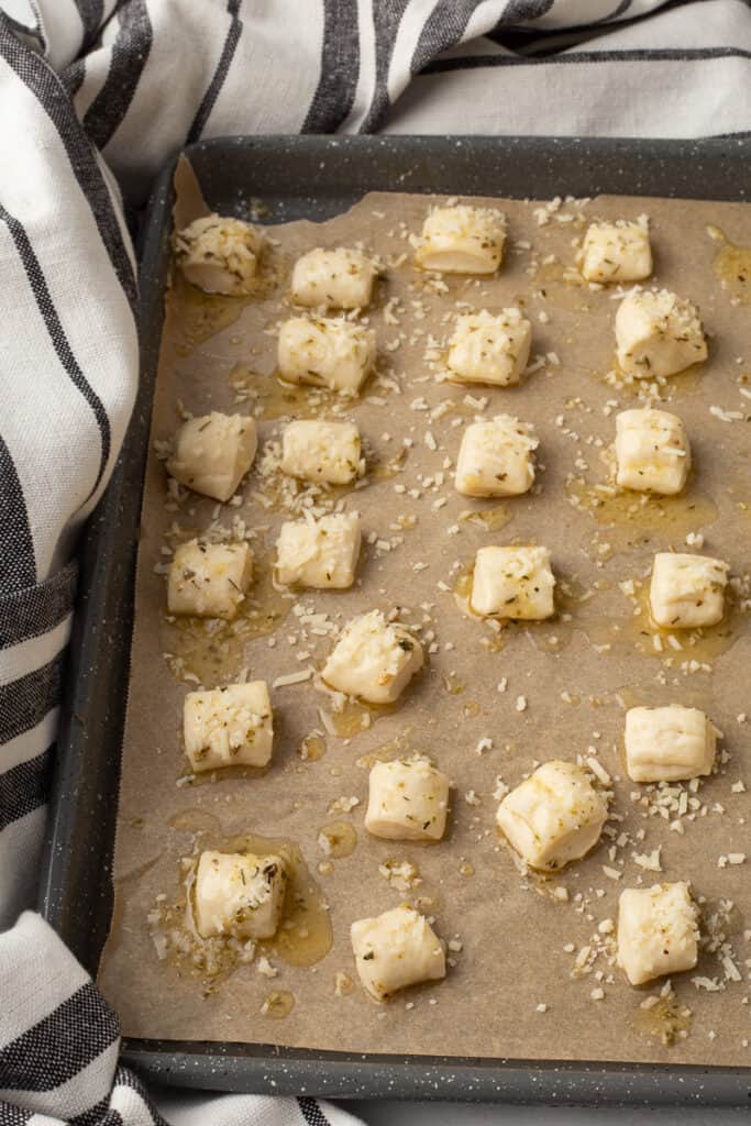 Parmesan Bread Bites Recipe | She's Not Cookin'