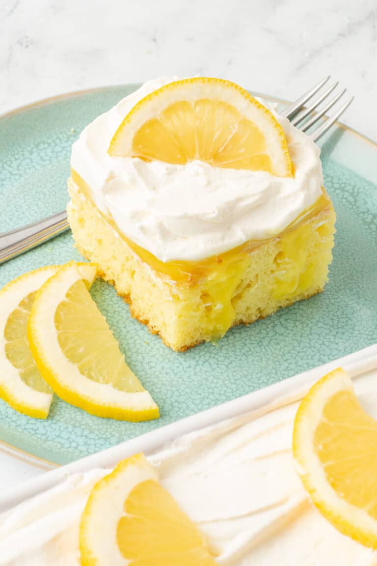 BEST Lemon Poke Cake Recipe (With Jello Pudding) | She's Not Cookin'