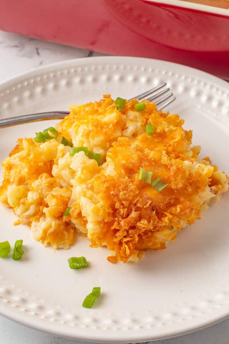 Cheesy Hashbrown Casserole with Corn Flakes Topping | She's Not Cookin'