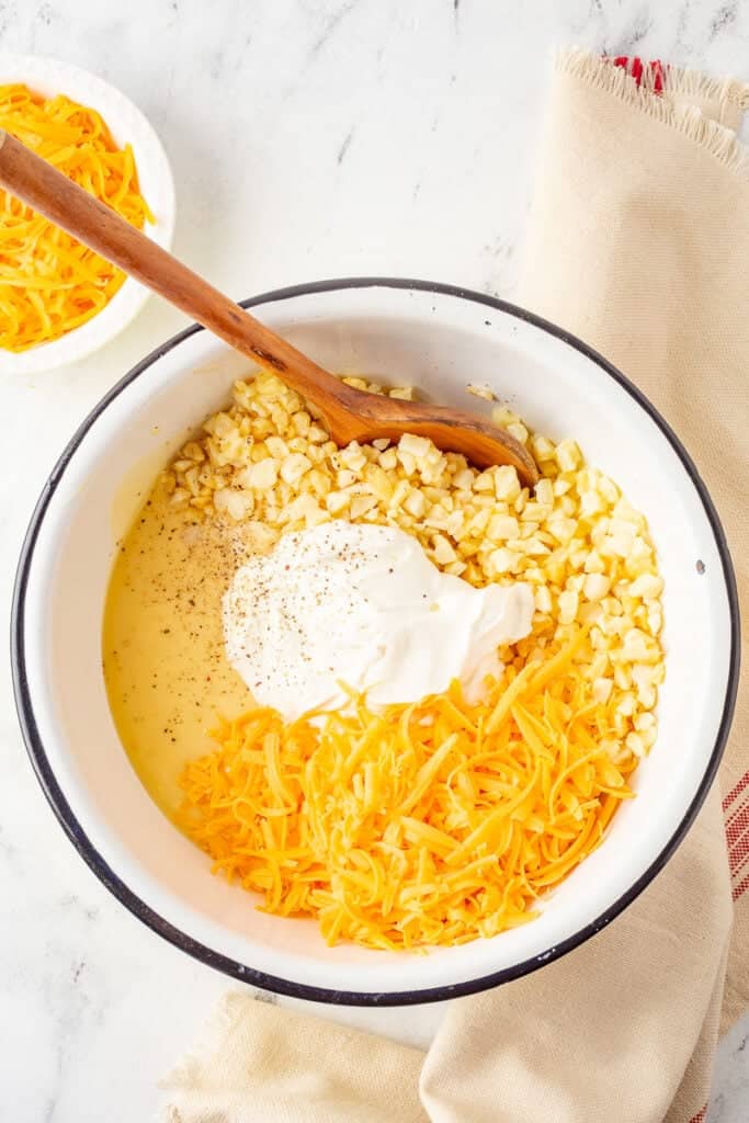 Cheesy Hashbrown Casserole with Corn Flakes Topping | She's Not Cookin'