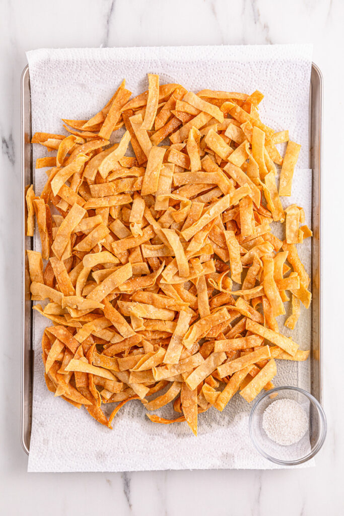 Easy Homemade Crunchy Tortilla Strips | She's Not Cookin'